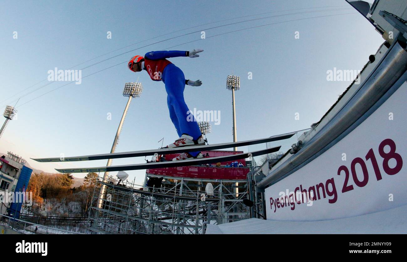 Tim Hug, of Switzerland, takes off during a training jump for the men's ...