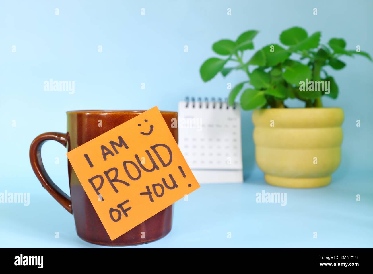 I am proud of you words of encouragement concept. Selective focus of a ...