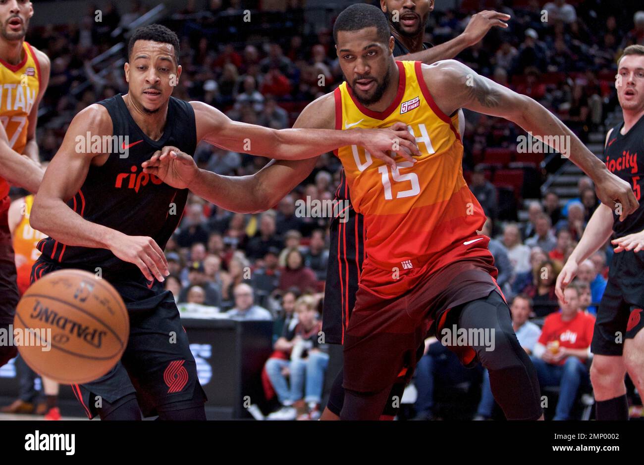 Utah Jazz forward Derrick Favors, right, and Portland Trail Blazers ...