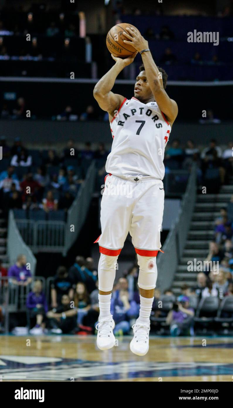 Toronto Raptors guard Kyle Lowry shoots against the Charlotte Hornets ...