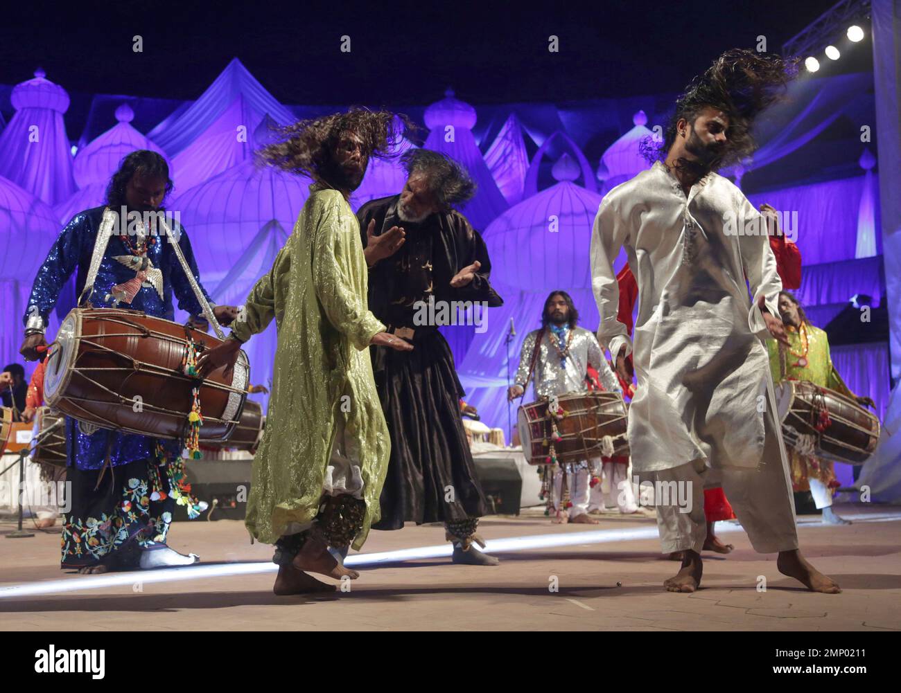 Pakistani folk dancers perform during the Mystic Music Sufi Festival in ...