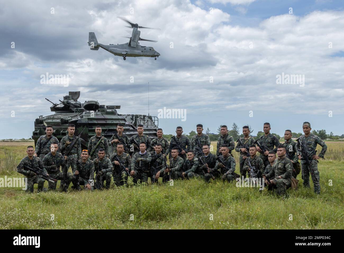 Philippine Marines pose for a group photo during KAMANDAG 6 while a U.S ...