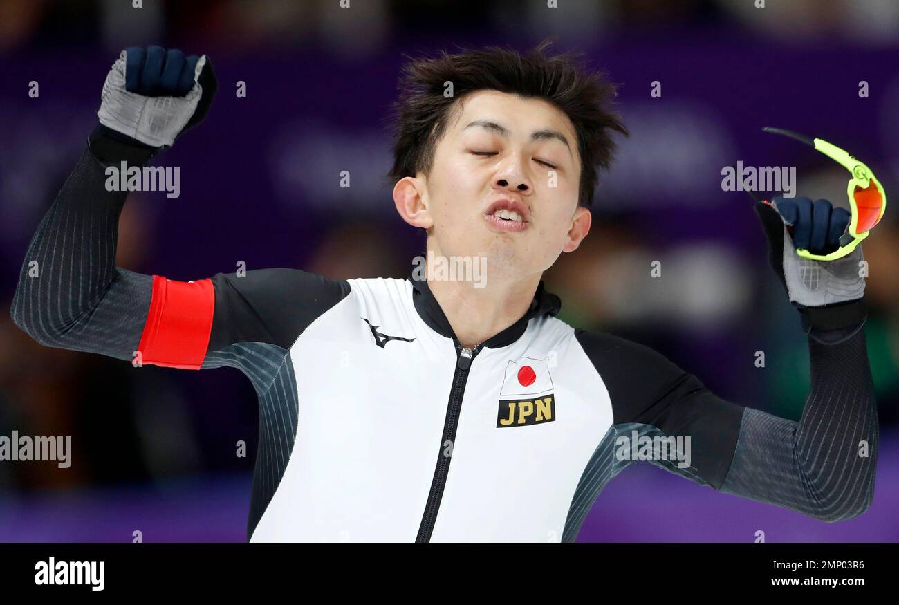 Japan's Seitaro Ichinohe celebrates after the men's 5,000 meters race ...