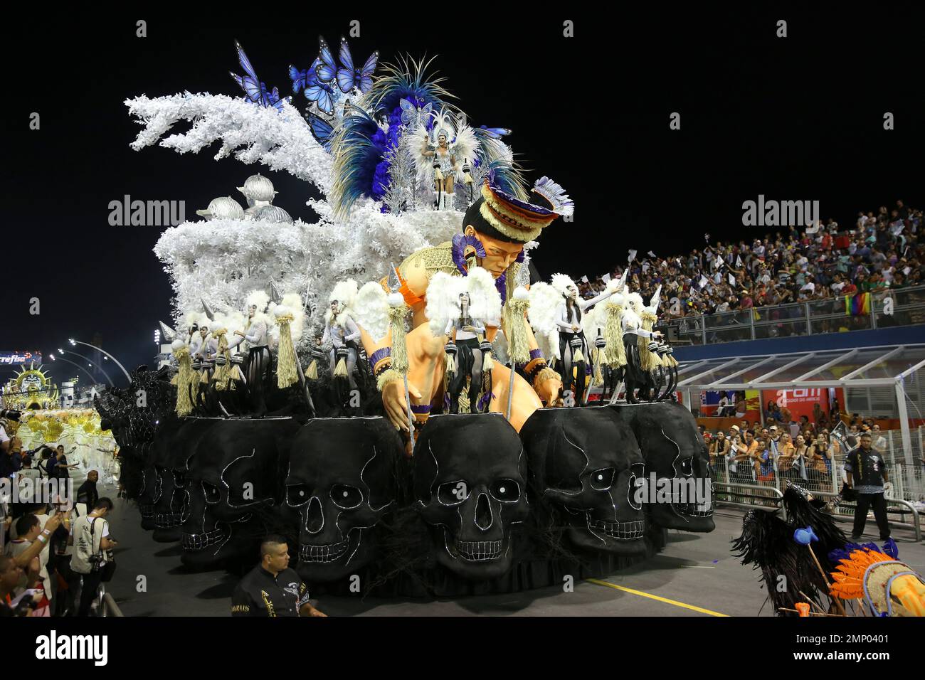 Dancers from the Gavioes da Fiel samba school perform on a float during ...