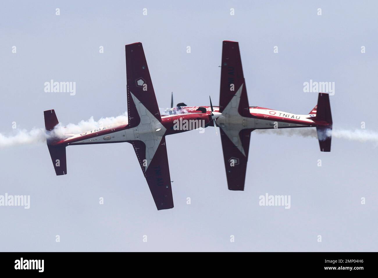 The Indonesian Air Force KT-1B Jupiter aerobatic team performs a ...