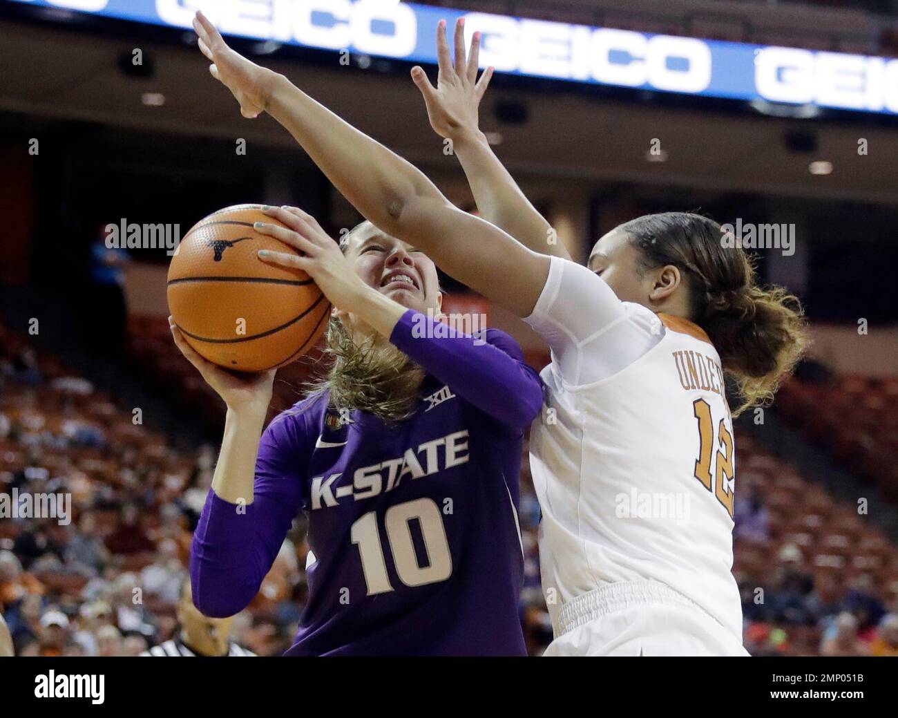 Kansas State guard Kayla Goth (10) is pressured by Texas guard Jada ...