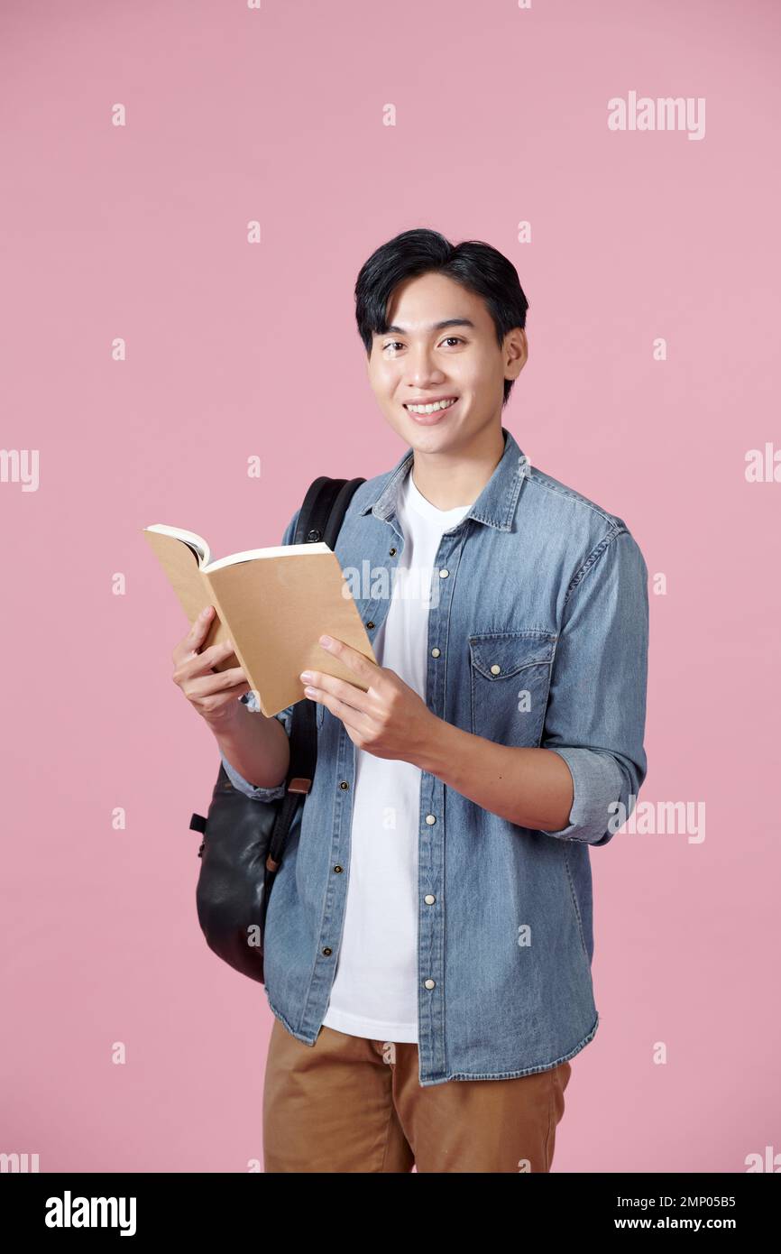 student with open book at school Stock Photo - Alamy