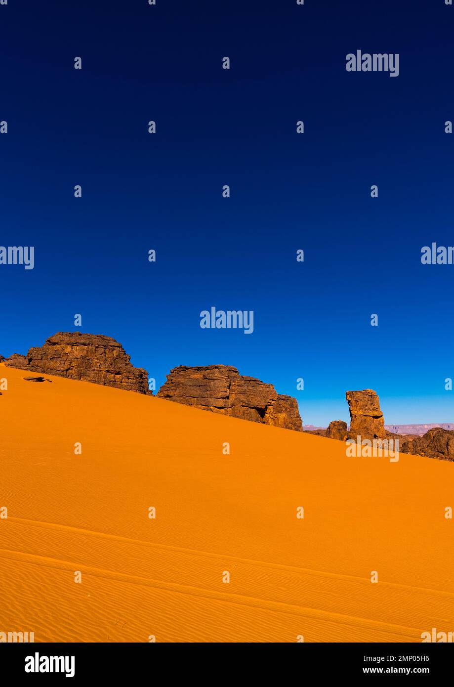 Rocks and sand dunes in Sahara desert, North Africa, Erg Admer, Algeria ...