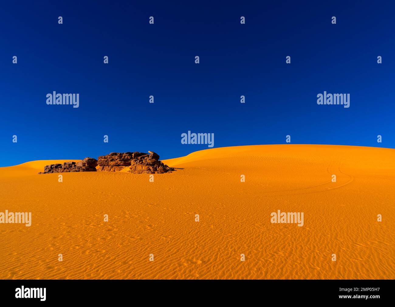 Rocks and sand dunes in Sahara desert, North Africa, Erg Admer, Algeria ...