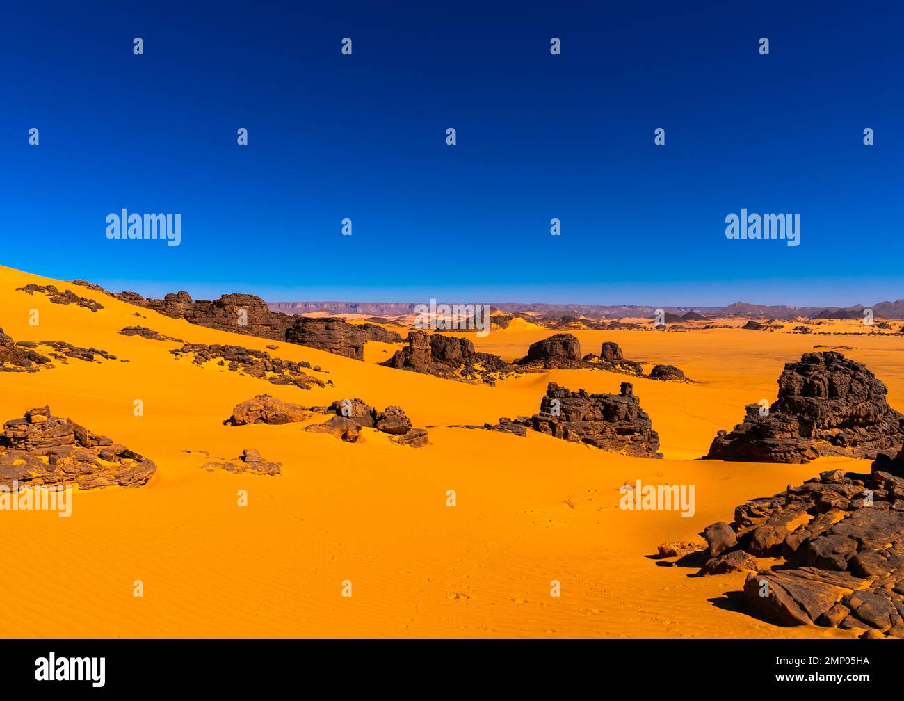 Rocks and sand dunes in Sahara desert, North Africa, Erg Admer, Algeria ...