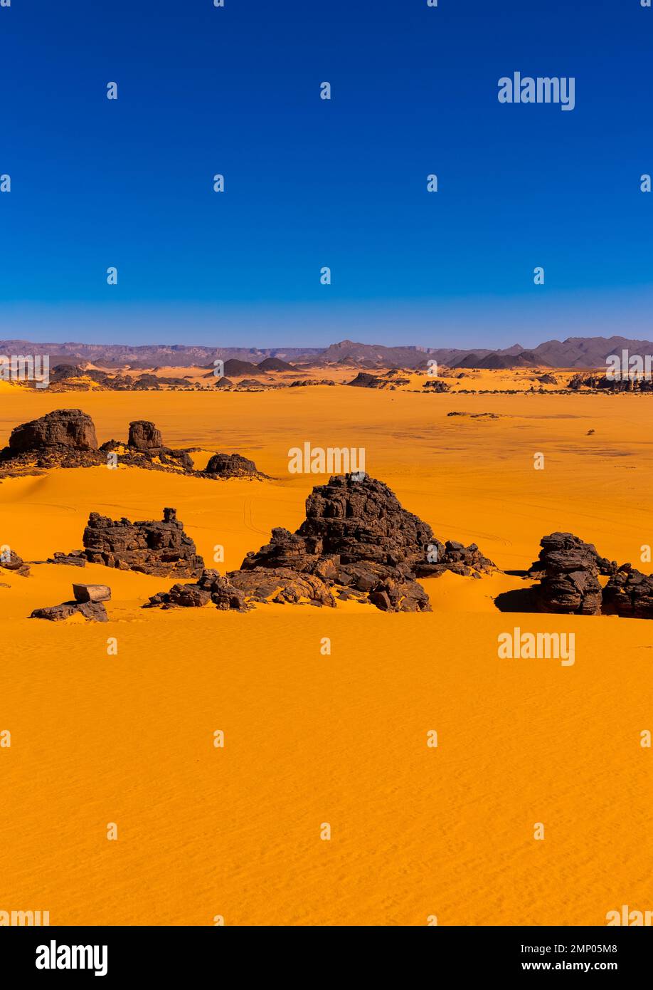 Rocks and sand dunes in Sahara desert, North Africa, Erg Admer, Algeria ...
