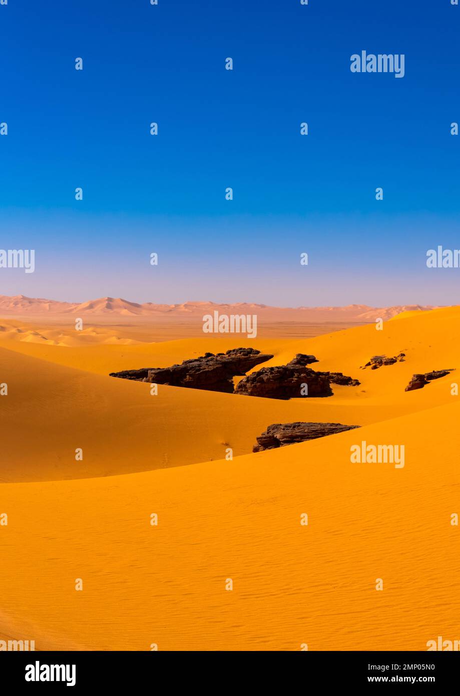 Rocks and sand dunes in Sahara desert, North Africa, Erg Admer, Algeria ...