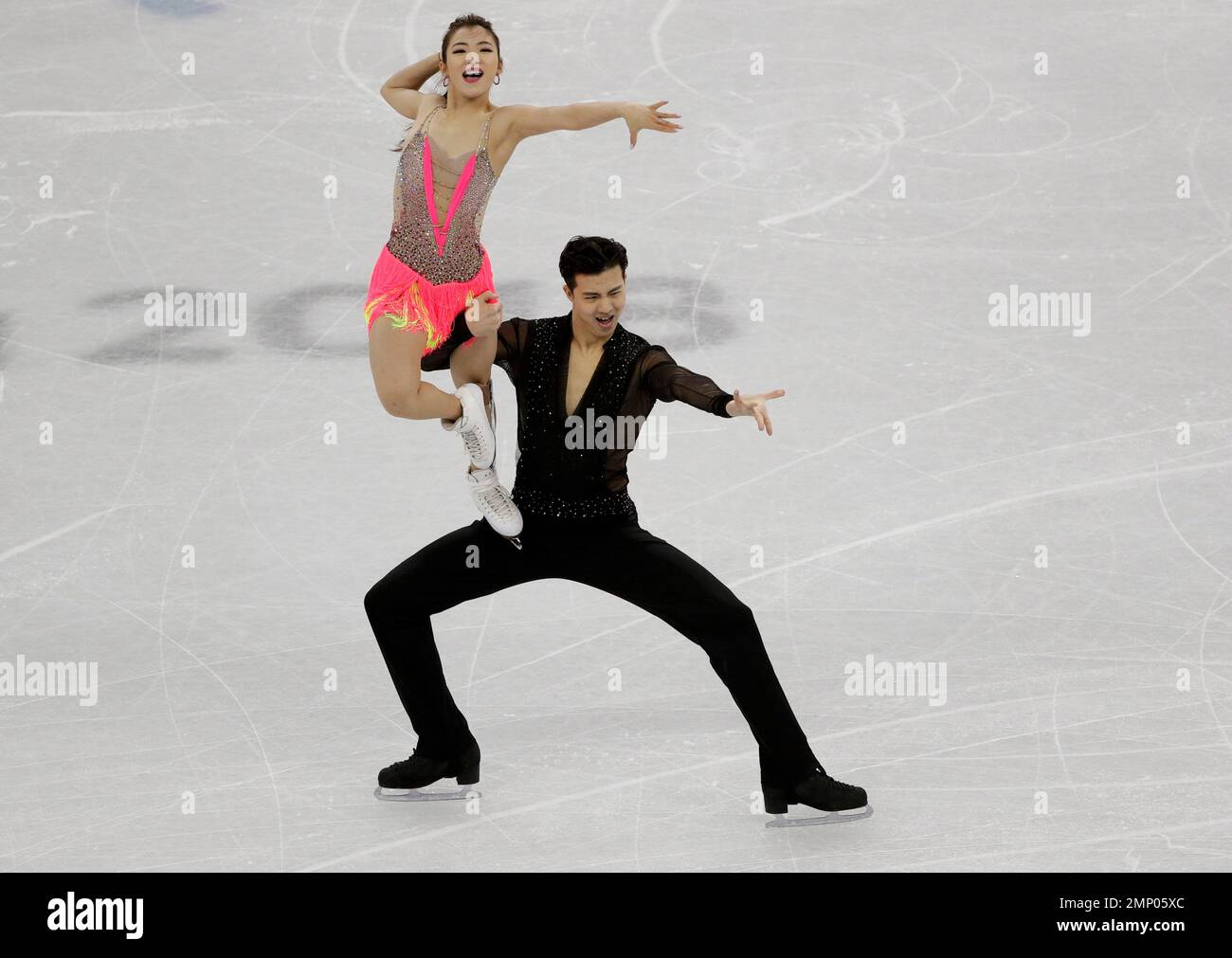 Wang Shiyue and Liu Xinyu of China perform during the ice dance short ...