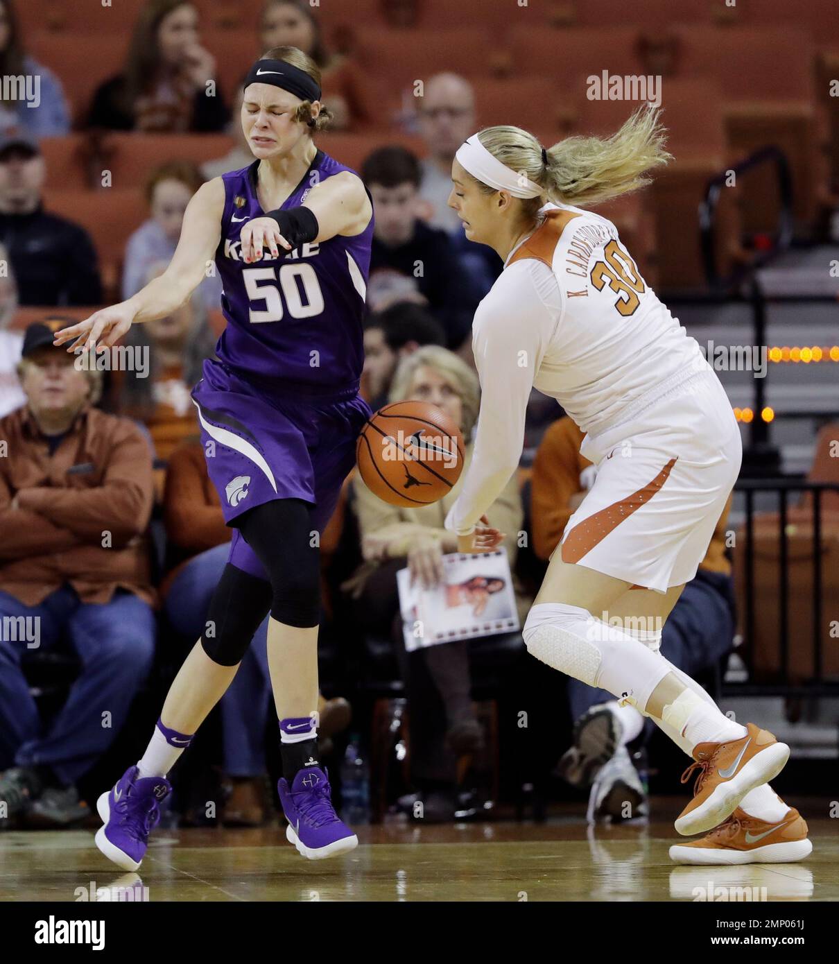 Kansas State guard Shaelyn Martin (50) is stripped of the ball by Texas ...