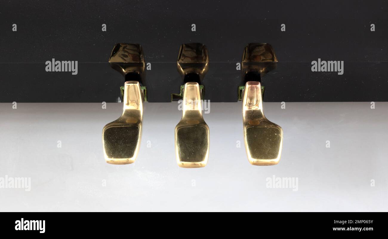 Old piano pedal with close-up shot, old pedal with scratches and dust ...