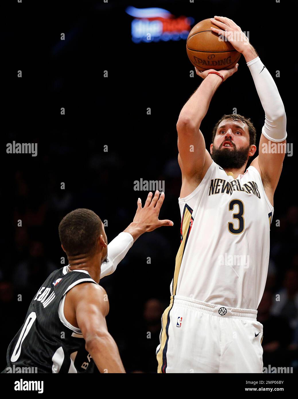New Orleans Pelicans' Nikola Mirotic (3) shoots over Brooklyn Nets ...