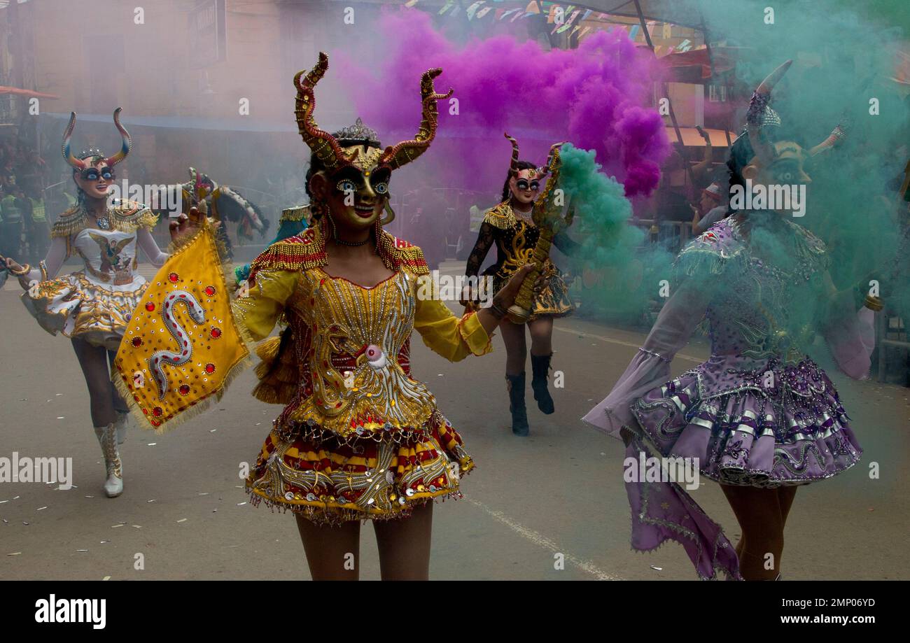 Dancers perform the traditional "Diablada" or Dance of the Devils ...
