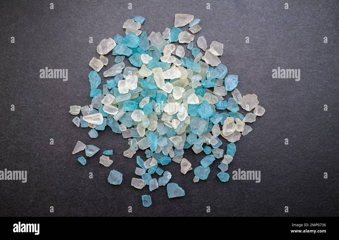 Top view of natural sea salt on dark background Stock Photo - Alamy
