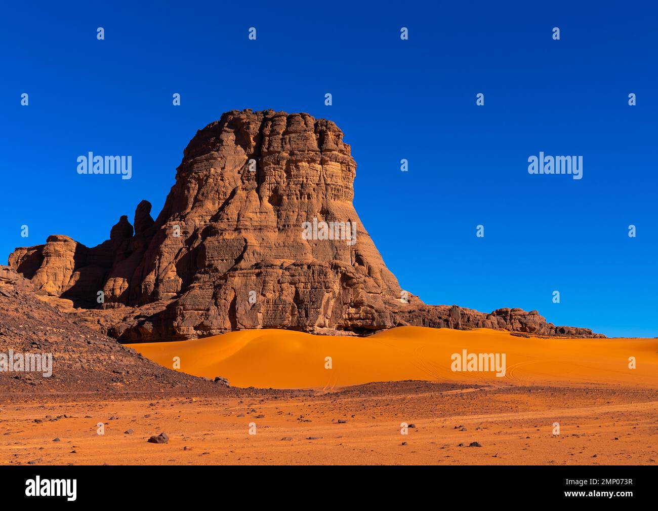 Rocks and sand dunes in Sahara desert, Tassili N'Ajjer National Park ...