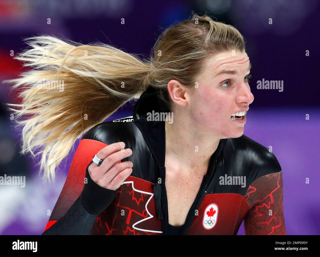 Brianne Tutt of Canada looks at the scoreboard after the women's 3,000 ...