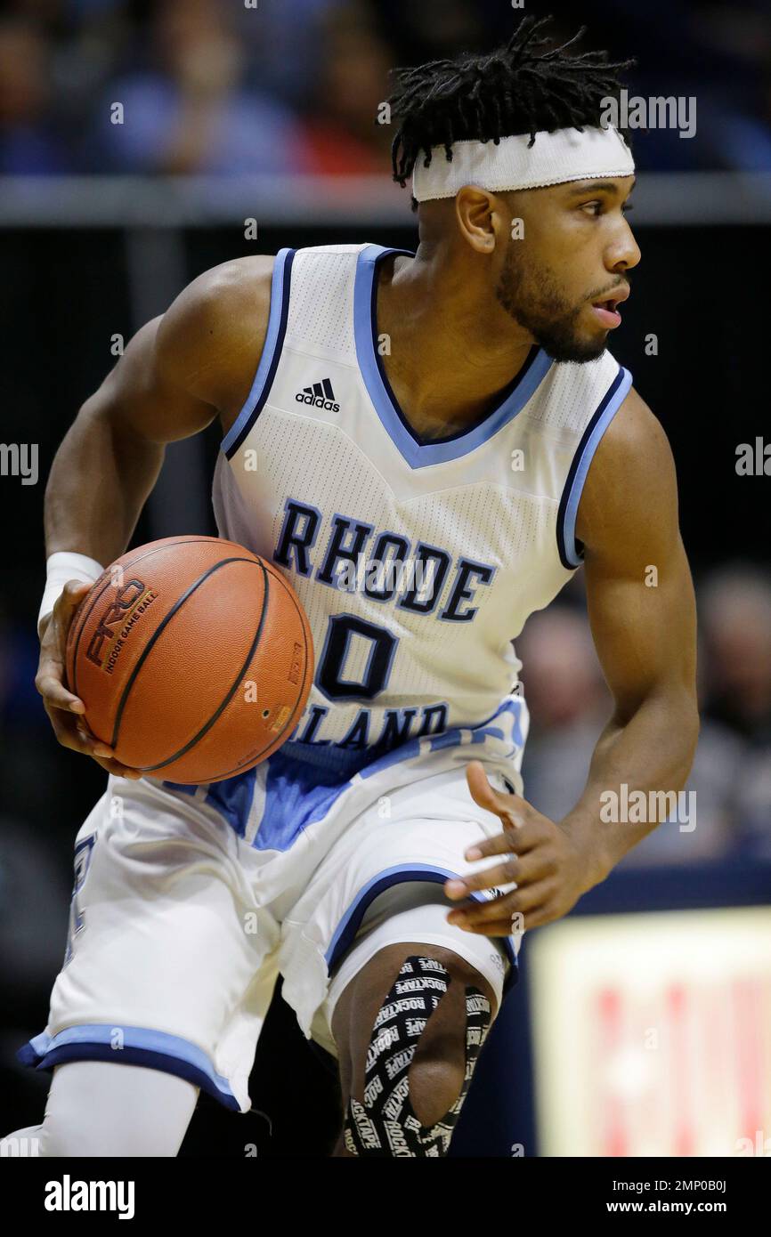 Rhode Island guard E.C. Matthews (0) turns and heads upcourt after ...