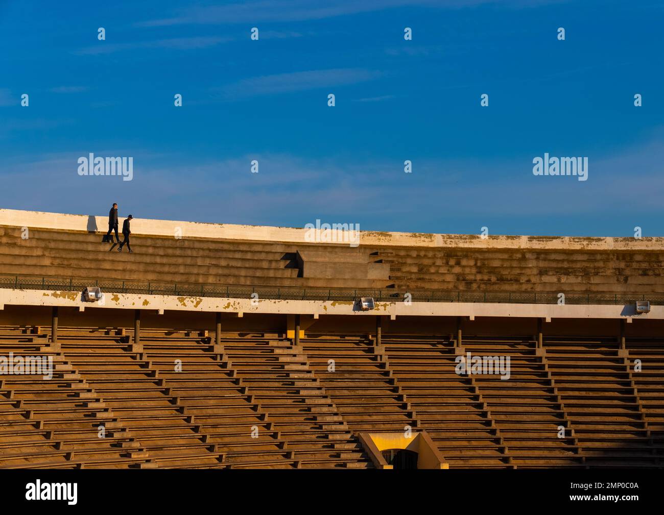 Men walking in the arena rows, North Africa, Oran, Algeria Stock Photo ...