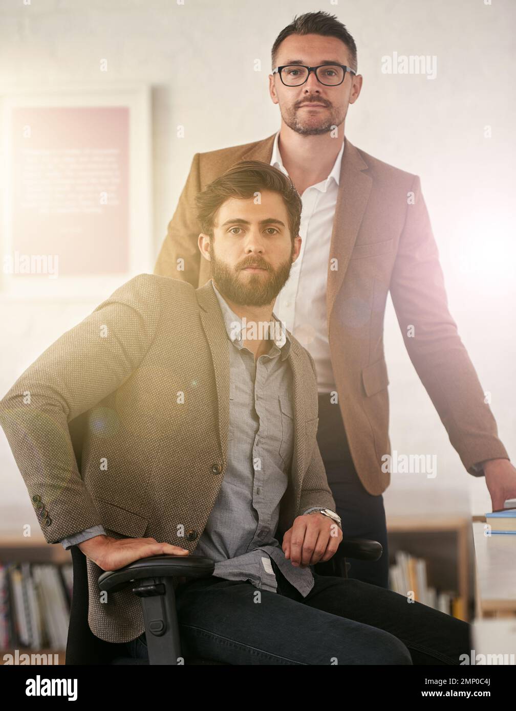 Teamwork leads to success. two designers in an office Stock Photo - Alamy