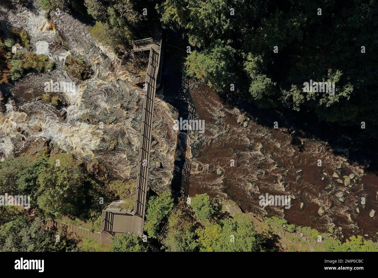 Aerial view of walking bridge over the river Vantaanjoki at Myllykoski ...
