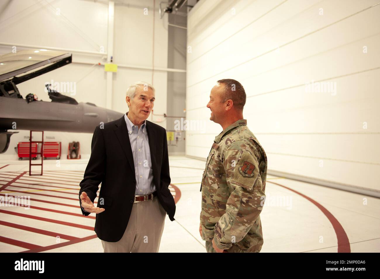 U.S. Senator Rob Portman talks with Senior Master Sgt. Nick Miller, a ...
