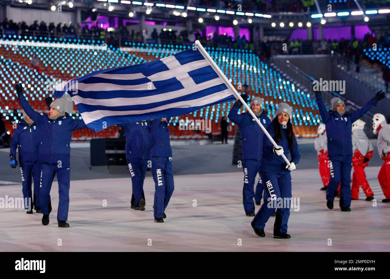 Sophia Ralli carries the flag of Greece during the opening ceremony of ...