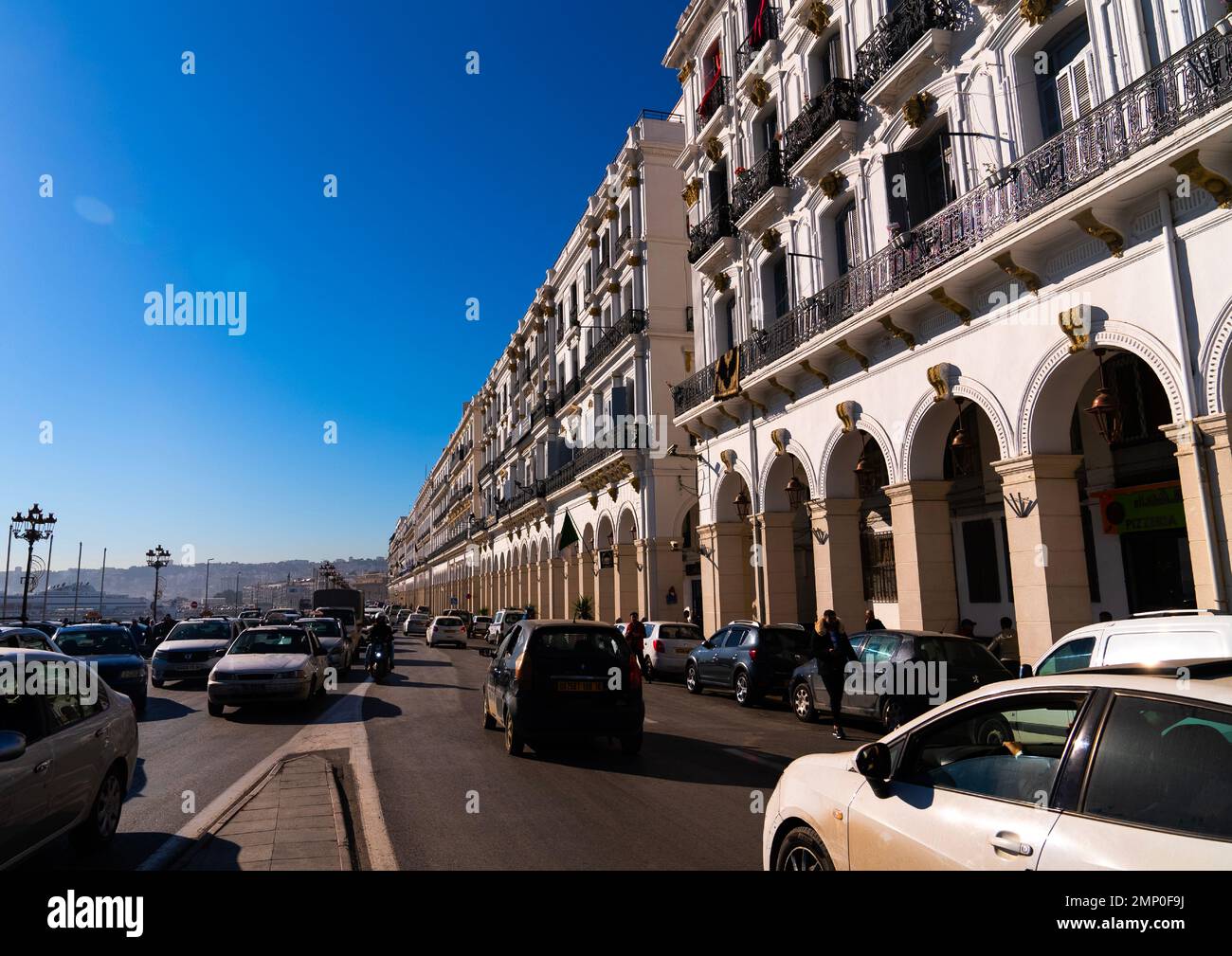 Old french colonial buildings on seaside boulevard, North Africa ...