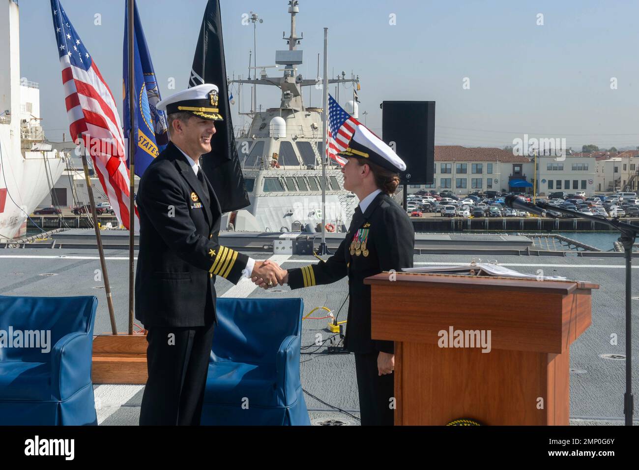 221007-N-ZS023-1059 SAN DIEGO (Oct 7, 2022) Capt. Marc Crawford, left ...