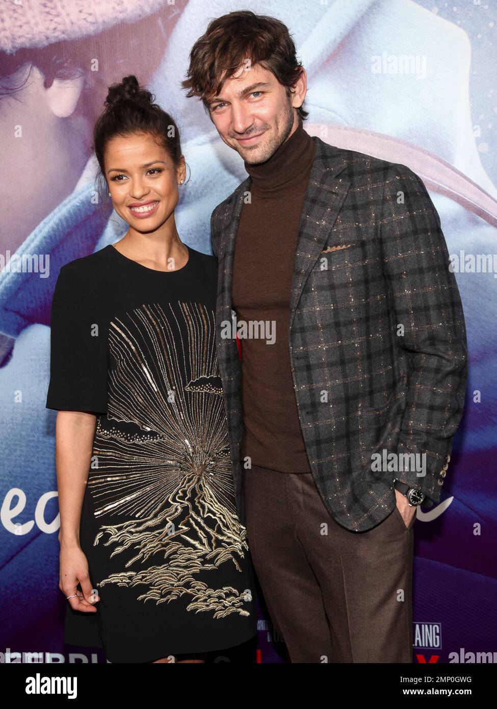 Gugu Mbatha-Raw, left, and Michiel Huisman, right, attend the special ...