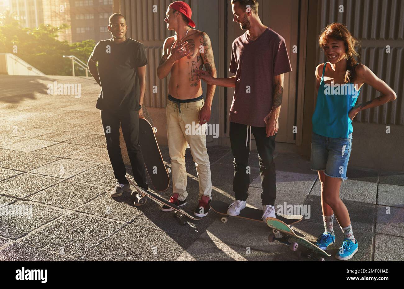 The world is our stadium. a group of skaters standing together Stock ...