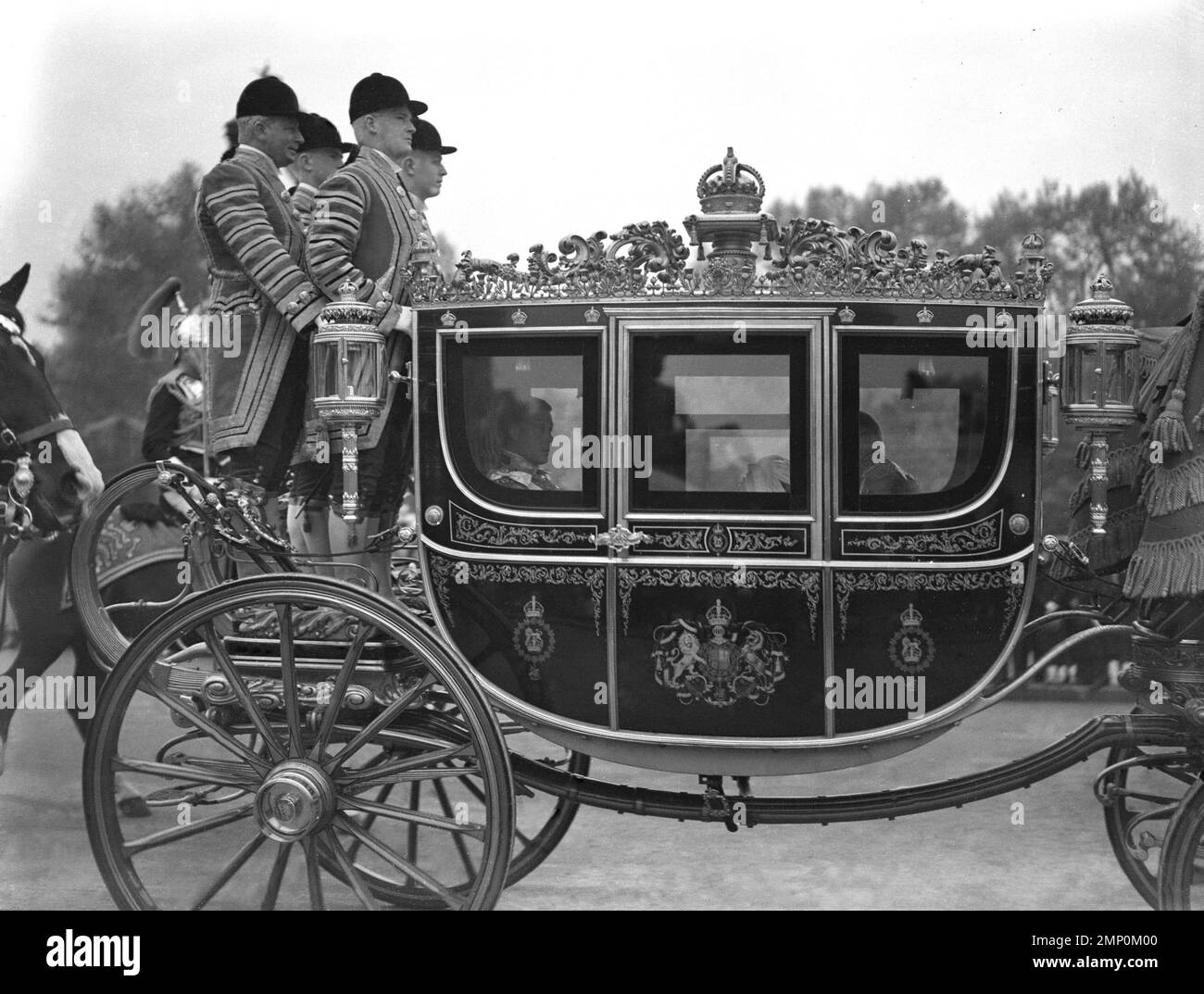King Edward VIII in a state coach as he left Buckingham Palace for St ...