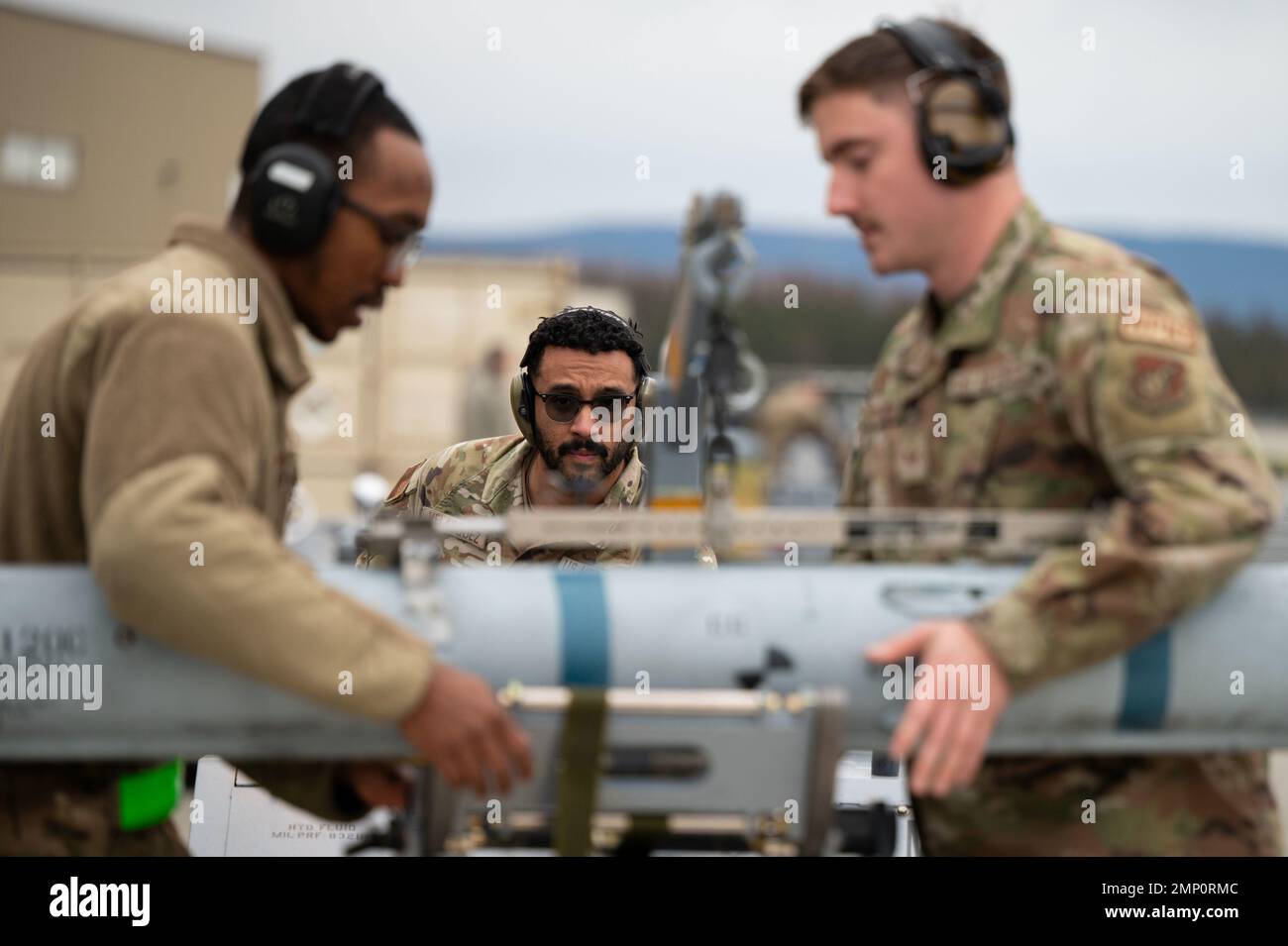 U.S. Air Force Staff Sgt. Anhre Bourgeois (left), a 356th Aircraft ...