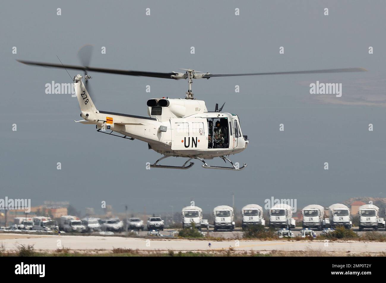 A United Nations helicopter carrying Italian peacekeepers takes off ...