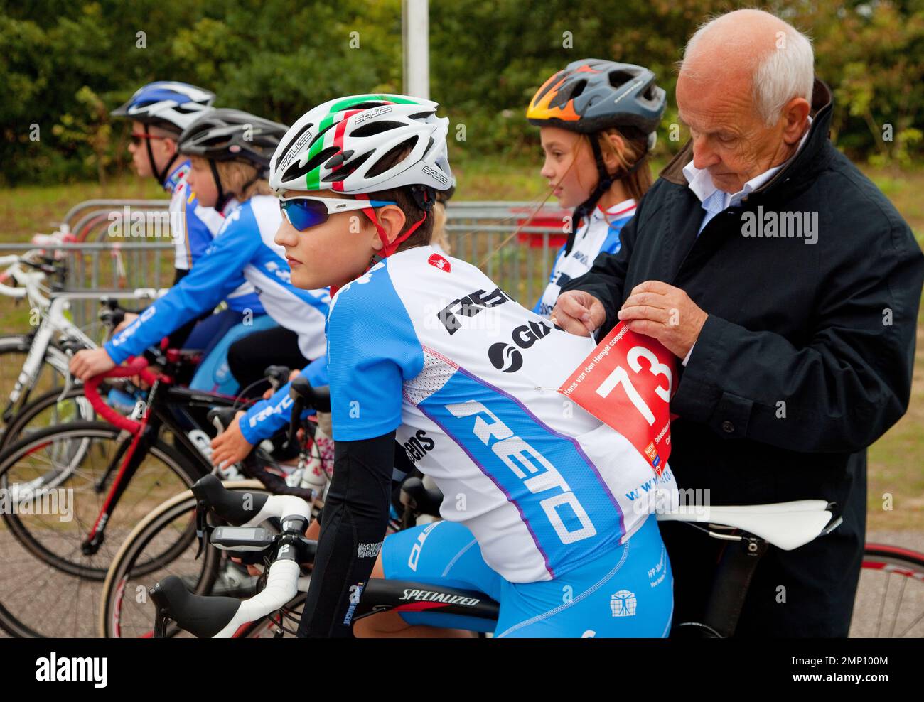 Netherlands. Youth member cycling club gets his race number pinned ...