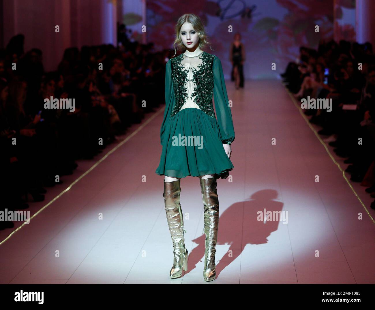 A model displays an outfit by Ukrainian designer Irina Dil during a ...