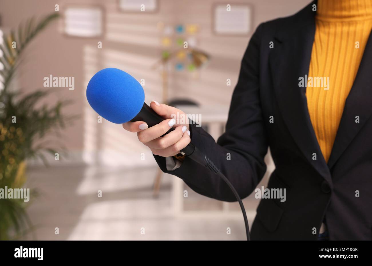 Modern female journalist in hi-res stock photography and images - Alamy