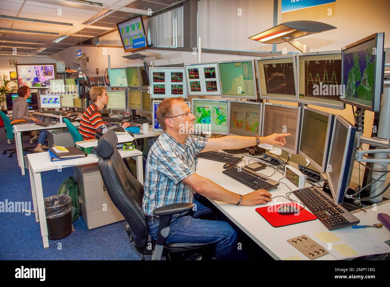 Netherlands, meteorologist collects data for a weather forecast at the ...