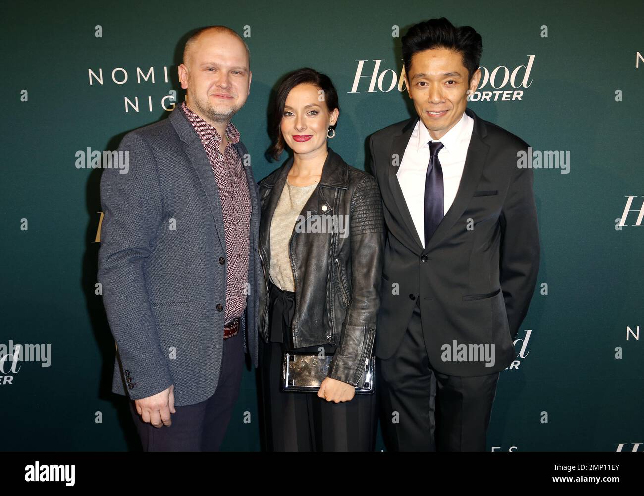David Malinowski, from left, Lucy Sibbick and Kazuhiro Tsuji arrive at ...