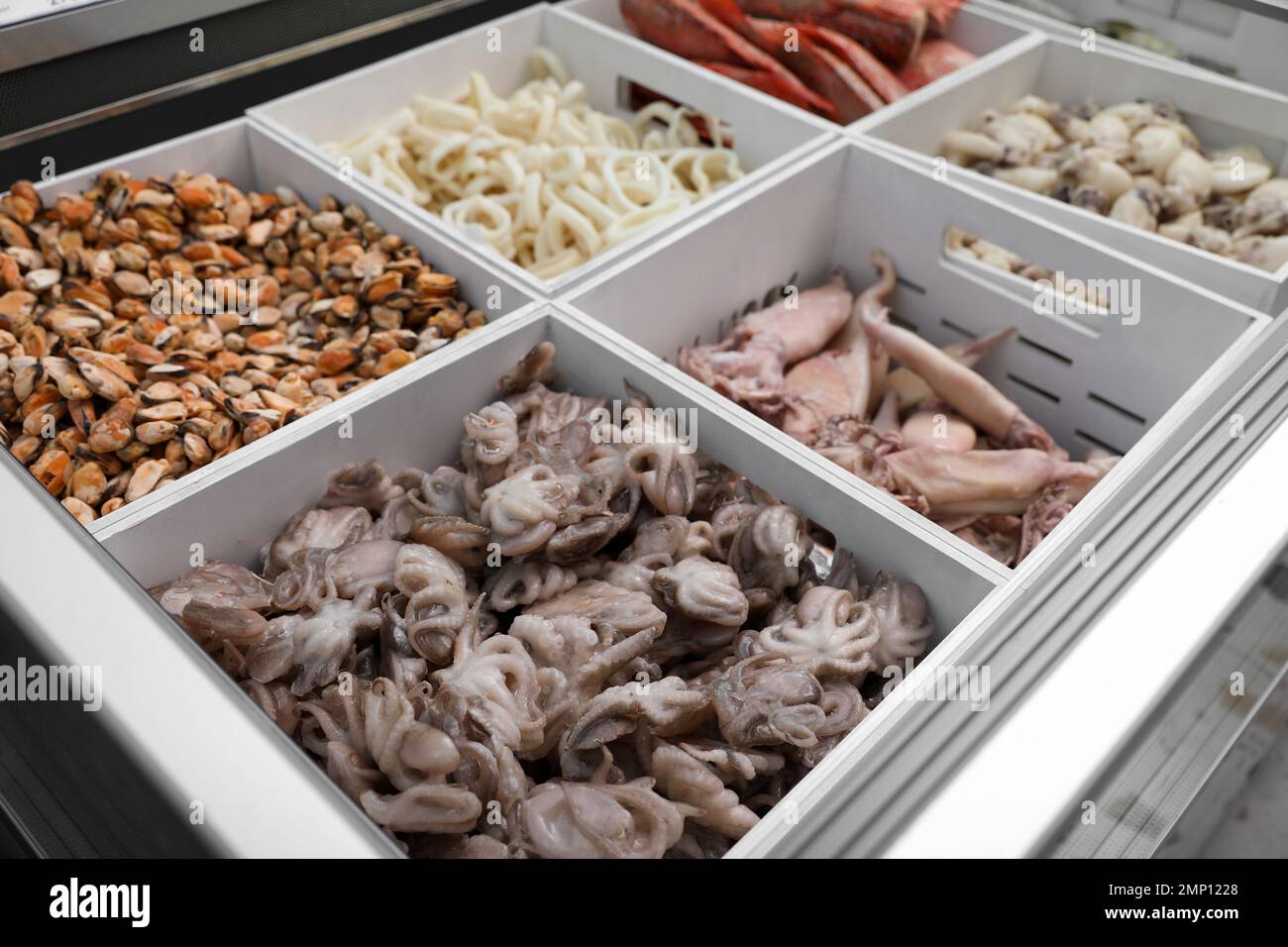 Different types of seafood on display. Wholesale market Stock Photo - Alamy