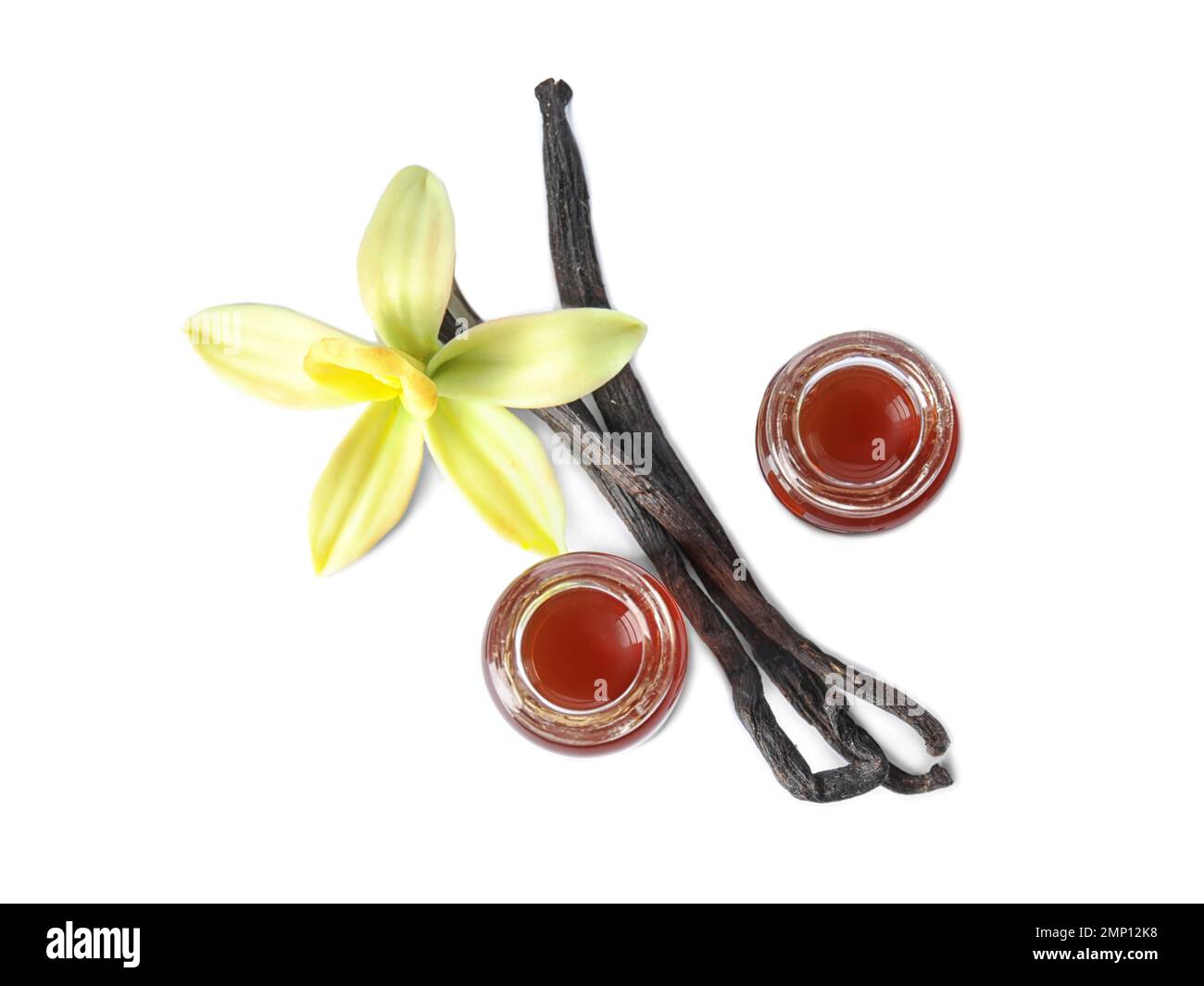 Vanilla extract, flower and dry pods isolated on white, top view Stock ...