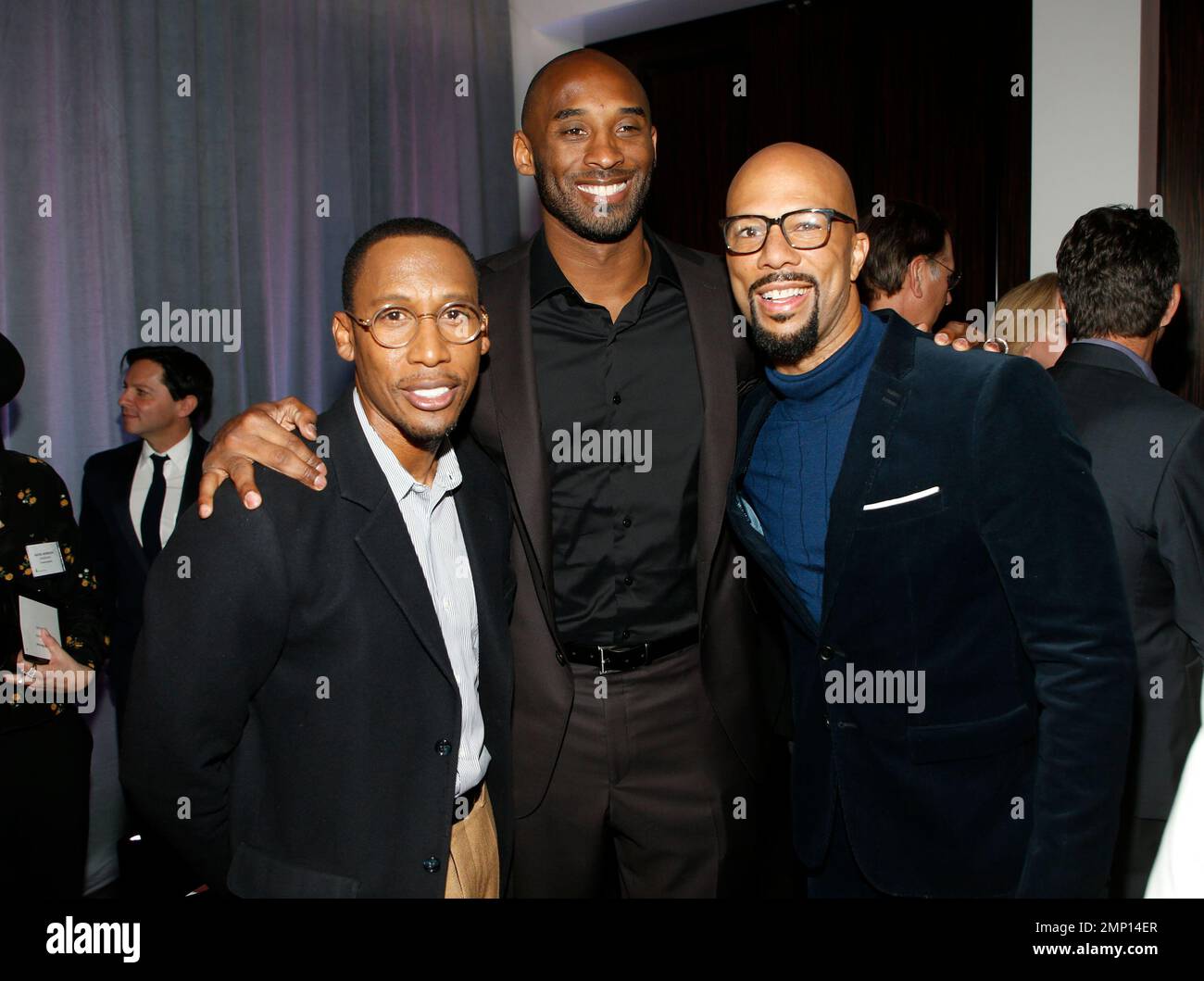 Raphael Saadiq, from left, Kobe Bryant and Common attend the 90th ...
