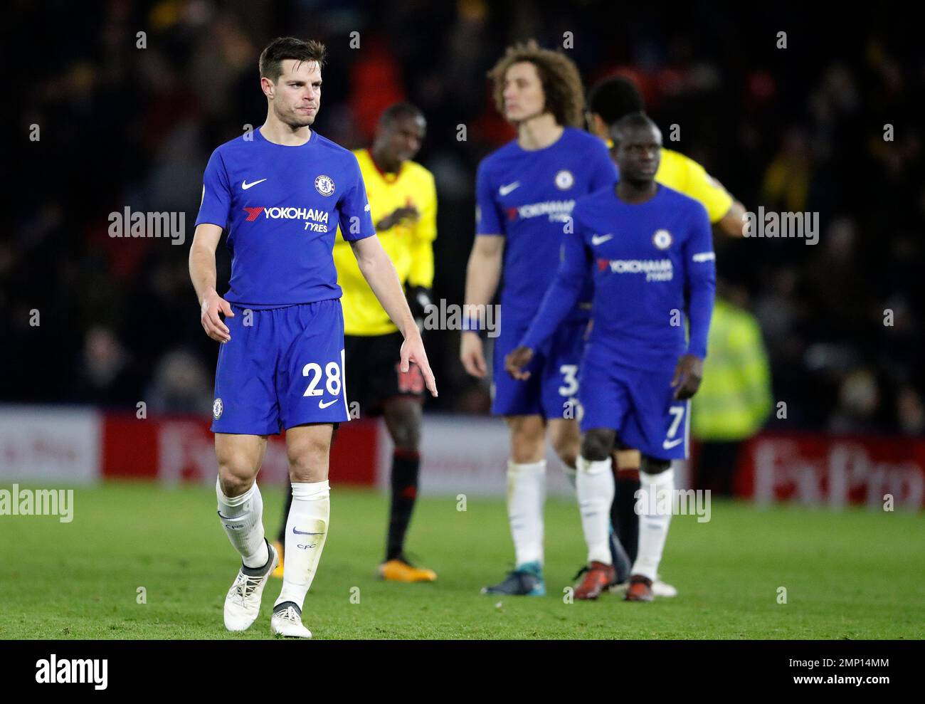 Chelsea players look dejected after their team lost the English Premier ...