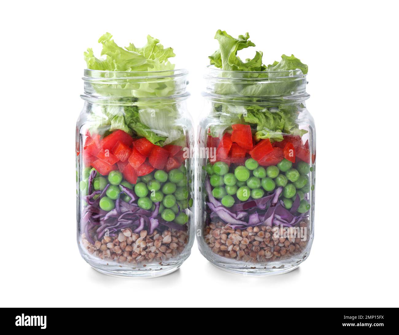 Healthy salad in glass jars isolated on white Stock Photo - Alamy