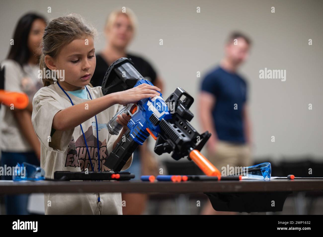 Military children participate in a simulated Combat Arms Training and ...