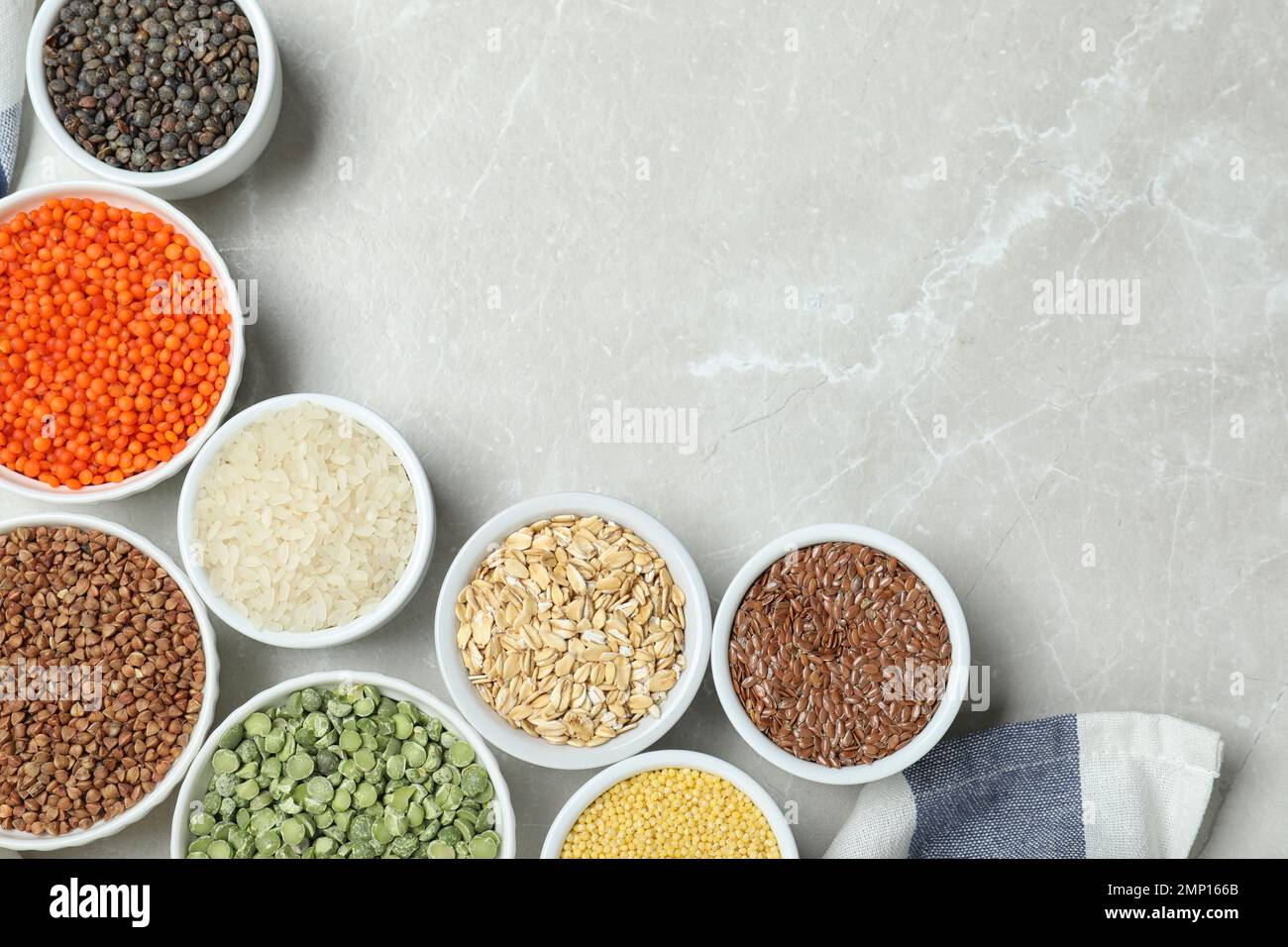 Flat lay composition with different types of legumes and cereals on ...