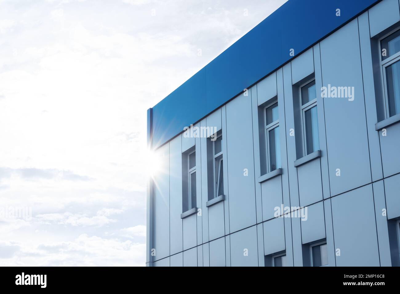 New modern building with tinted windows outdoors Stock Photo - Alamy